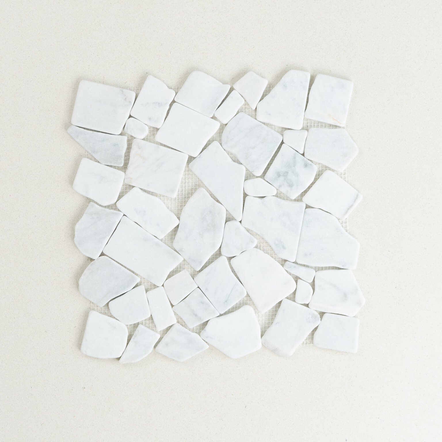 Crazy Pave Carrara Tumbled Marble Mosaic - Design Tiles Sydney